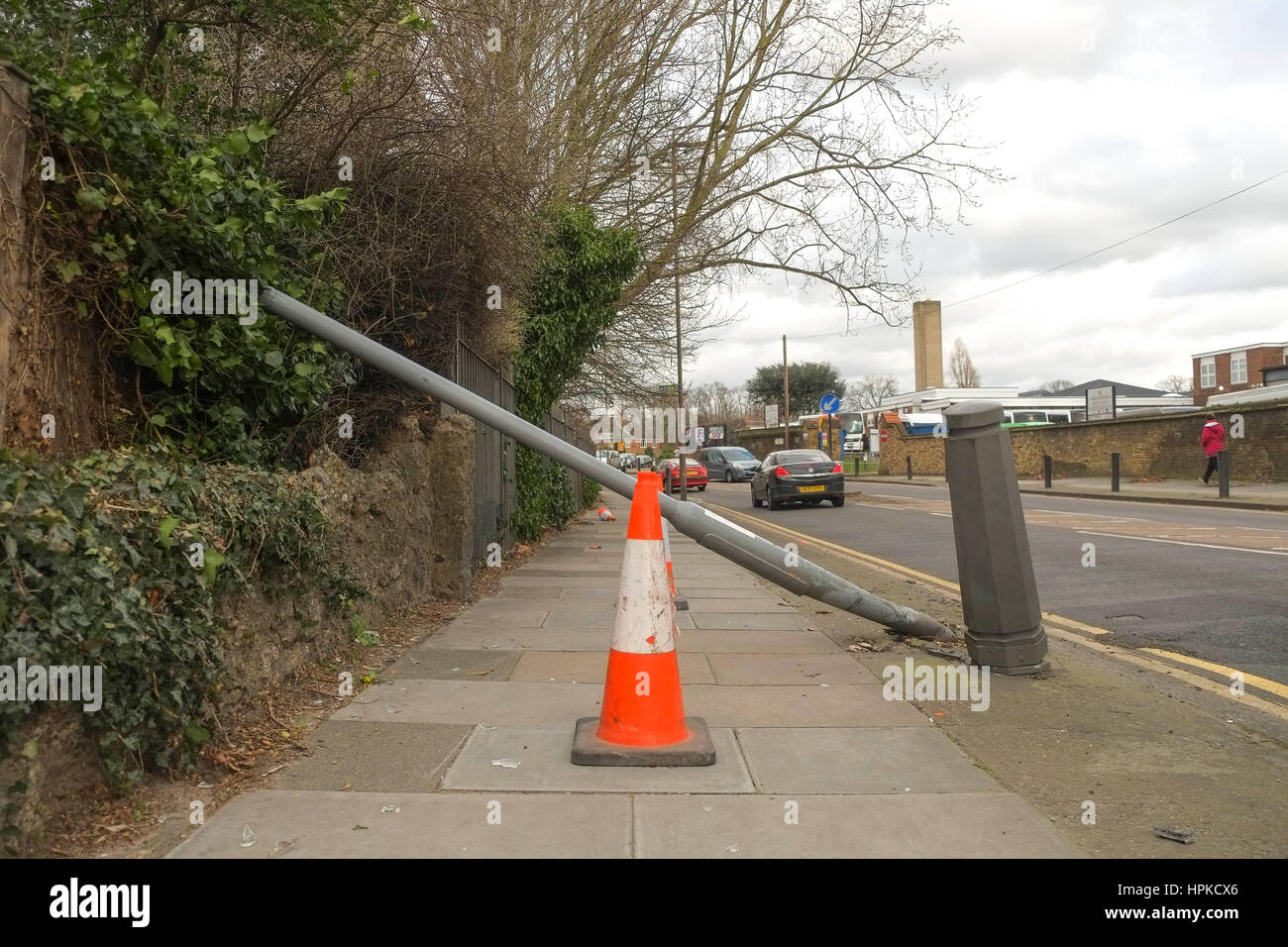 London, UK. 23rd Feb, 2017. Lamp post torn out of the ground by Storm ...
