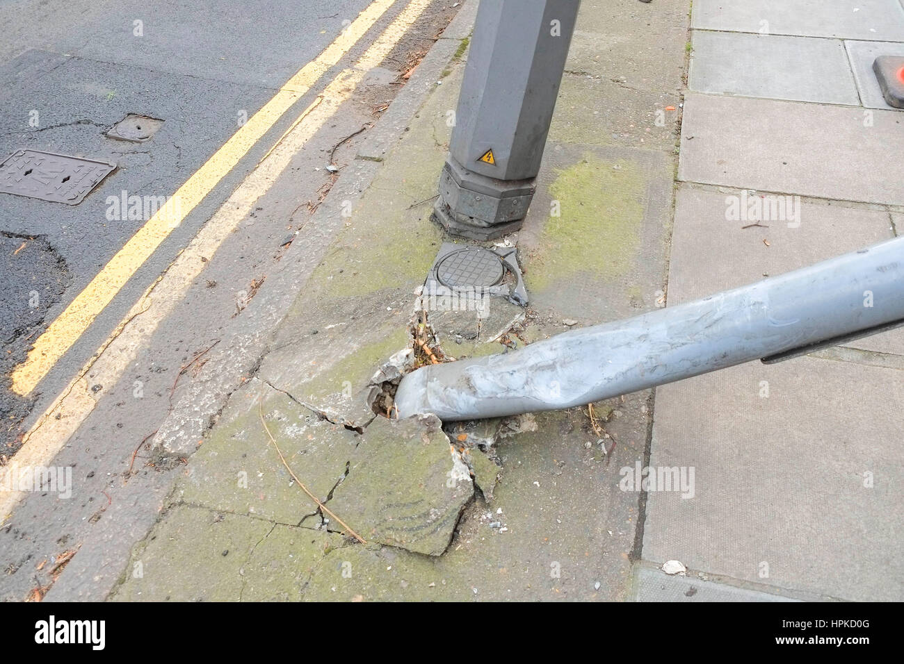 London, UK. 23rd Feb, 2017. Lamp post torn out of the ground by Storm ...