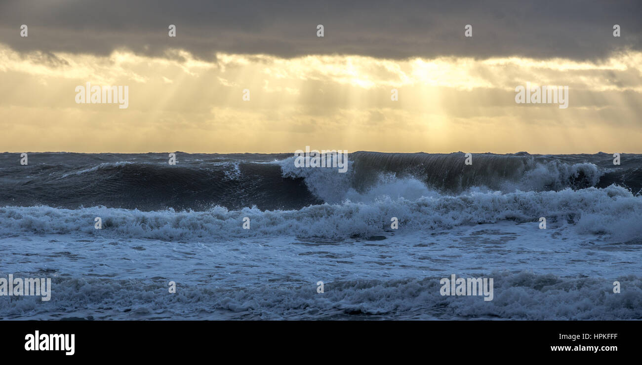 Sun rays Looking out at sea Stock Photo - Alamy