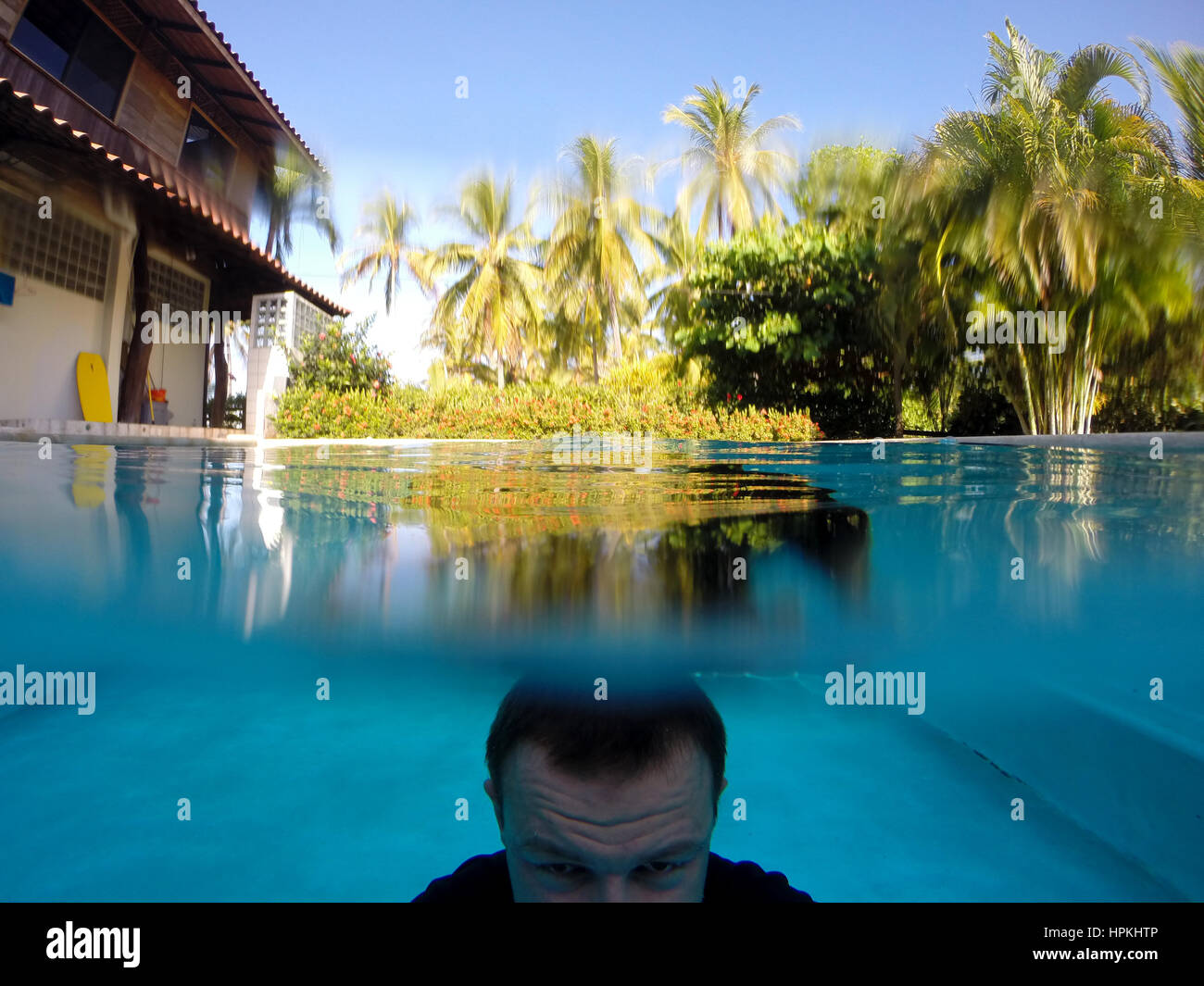 Man in swimming pool Stock Photo - Alamy