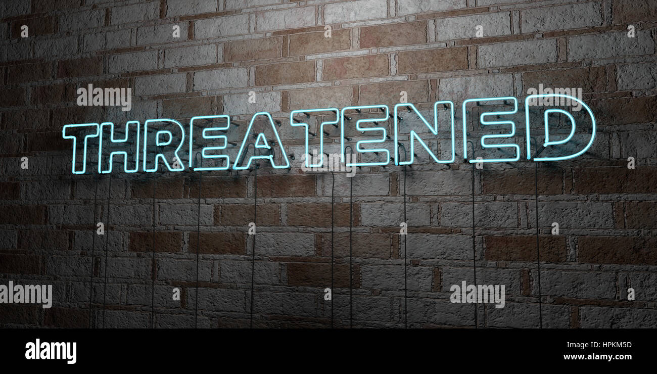 THREATENED - Glowing Neon Sign on stonework wall - 3D rendered royalty ...