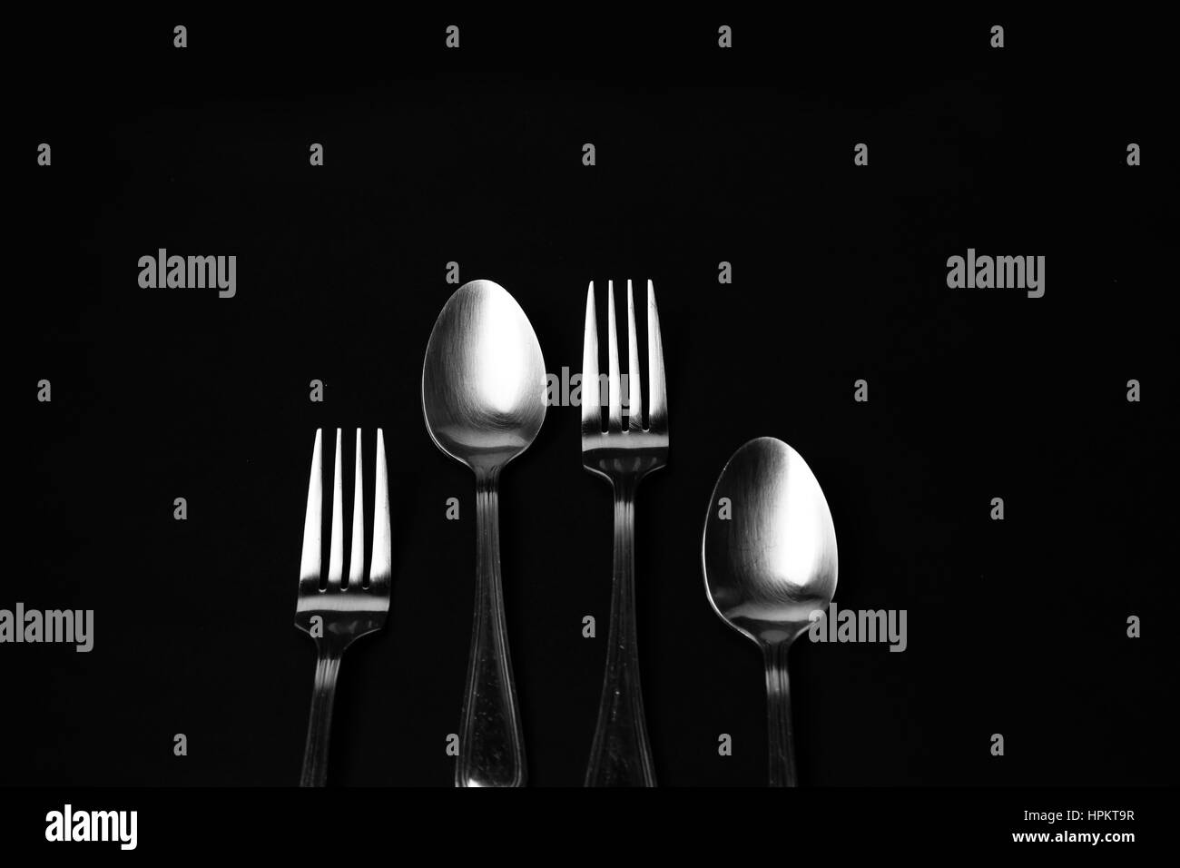 Fork and spoon background / spoons are the primary utensil used for ...