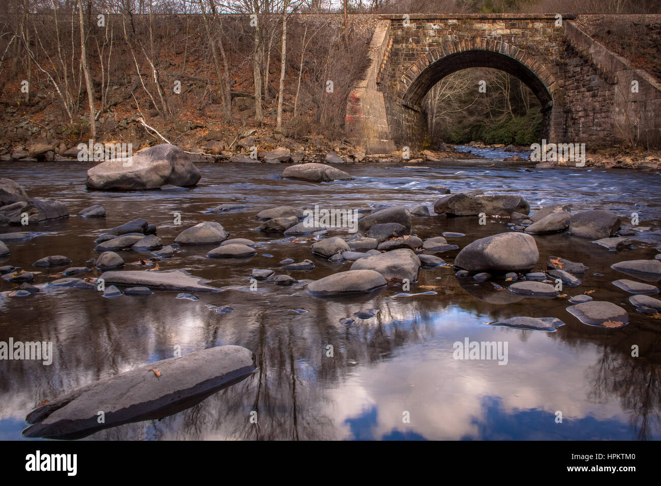 Lehigh Gorge State Park in late fall afternoon with old train tressel ...