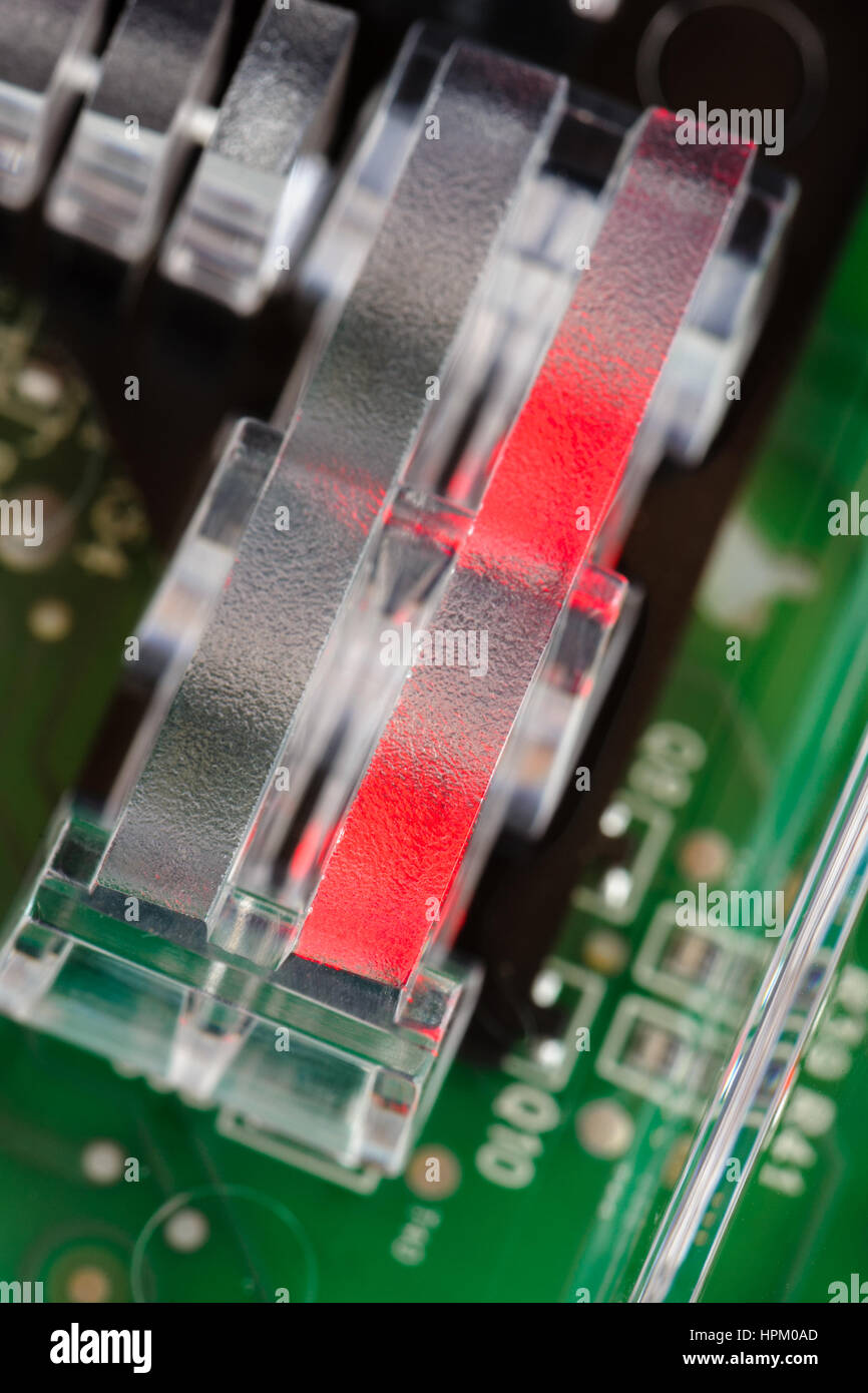closeup red LED (Light Emitting Diode) indicator Stock Photo - Alamy