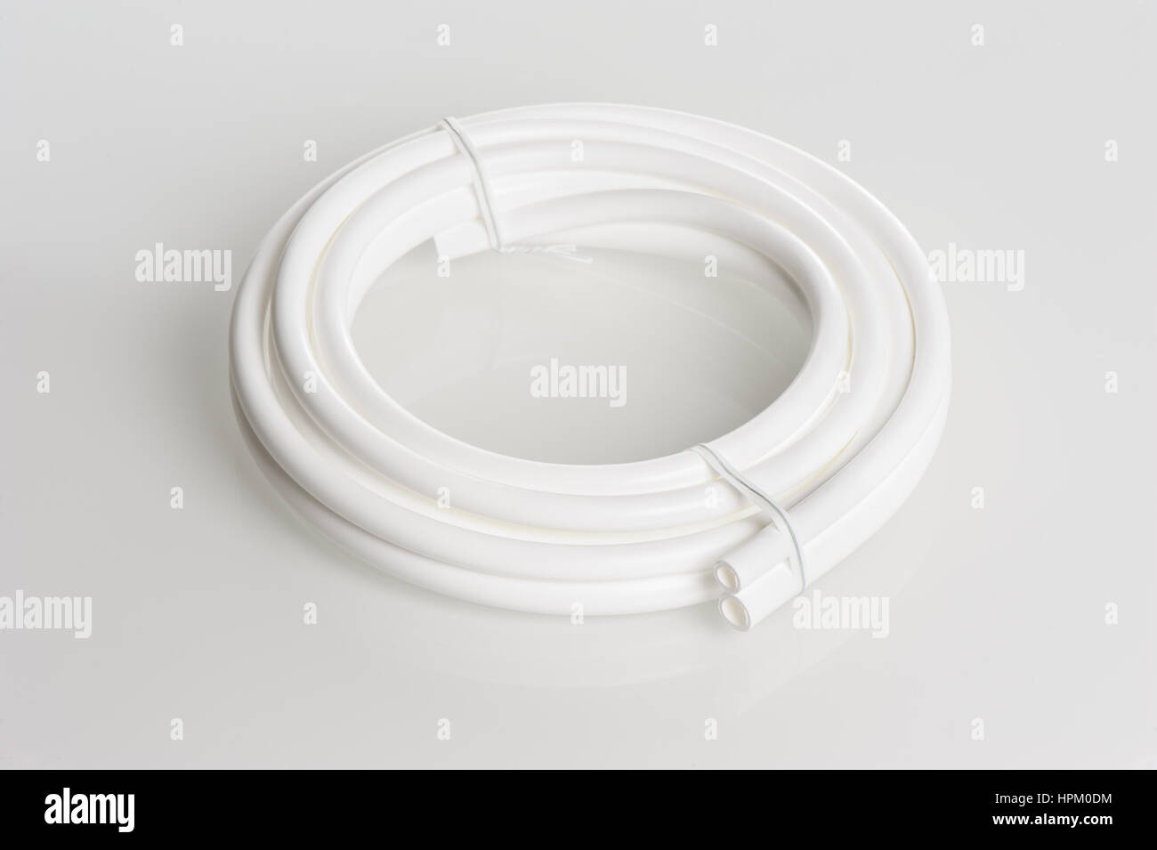white rubber tube for water purifier Stock Photo - Alamy