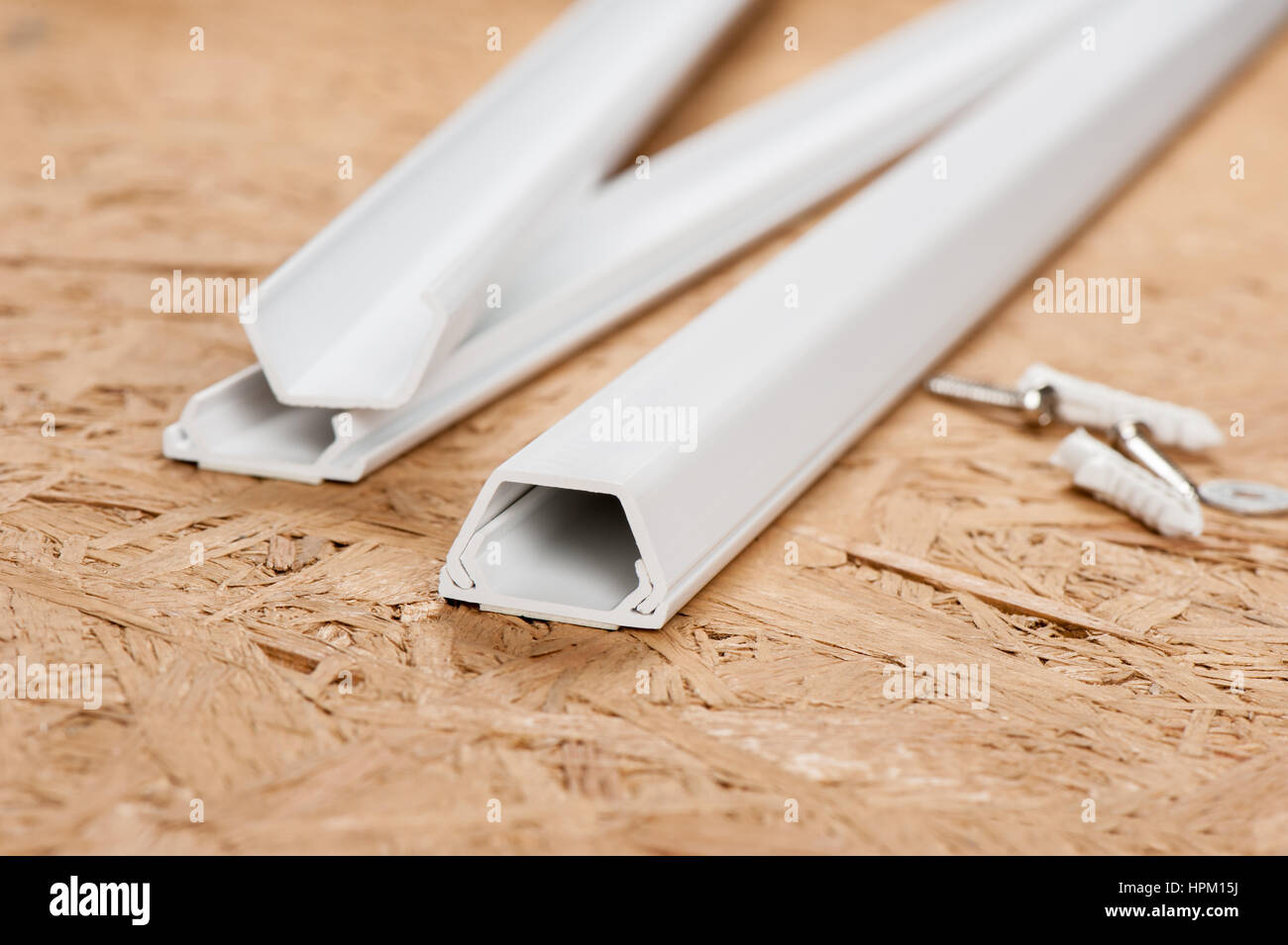 easy install white plastic wiring duct Stock Photo - Alamy