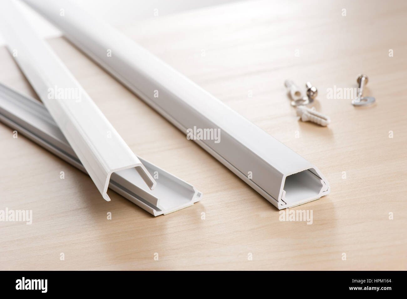 easy install white plastic wiring duct Stock Photo - Alamy