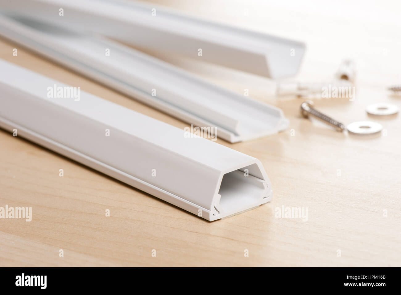 easy install white plastic wiring duct Stock Photo - Alamy