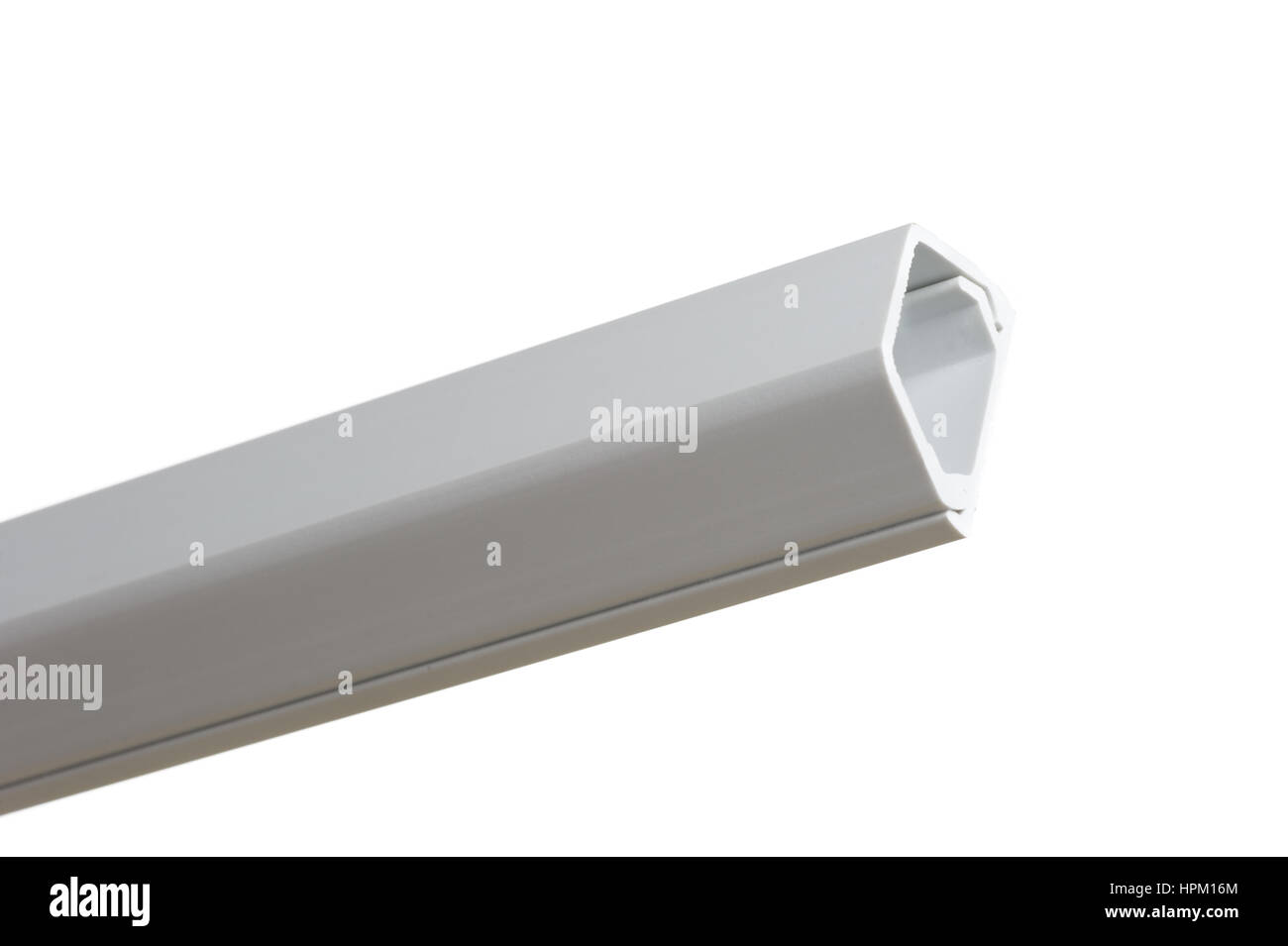 white plastic wiring duct isolated on white background Stock Photo - Alamy