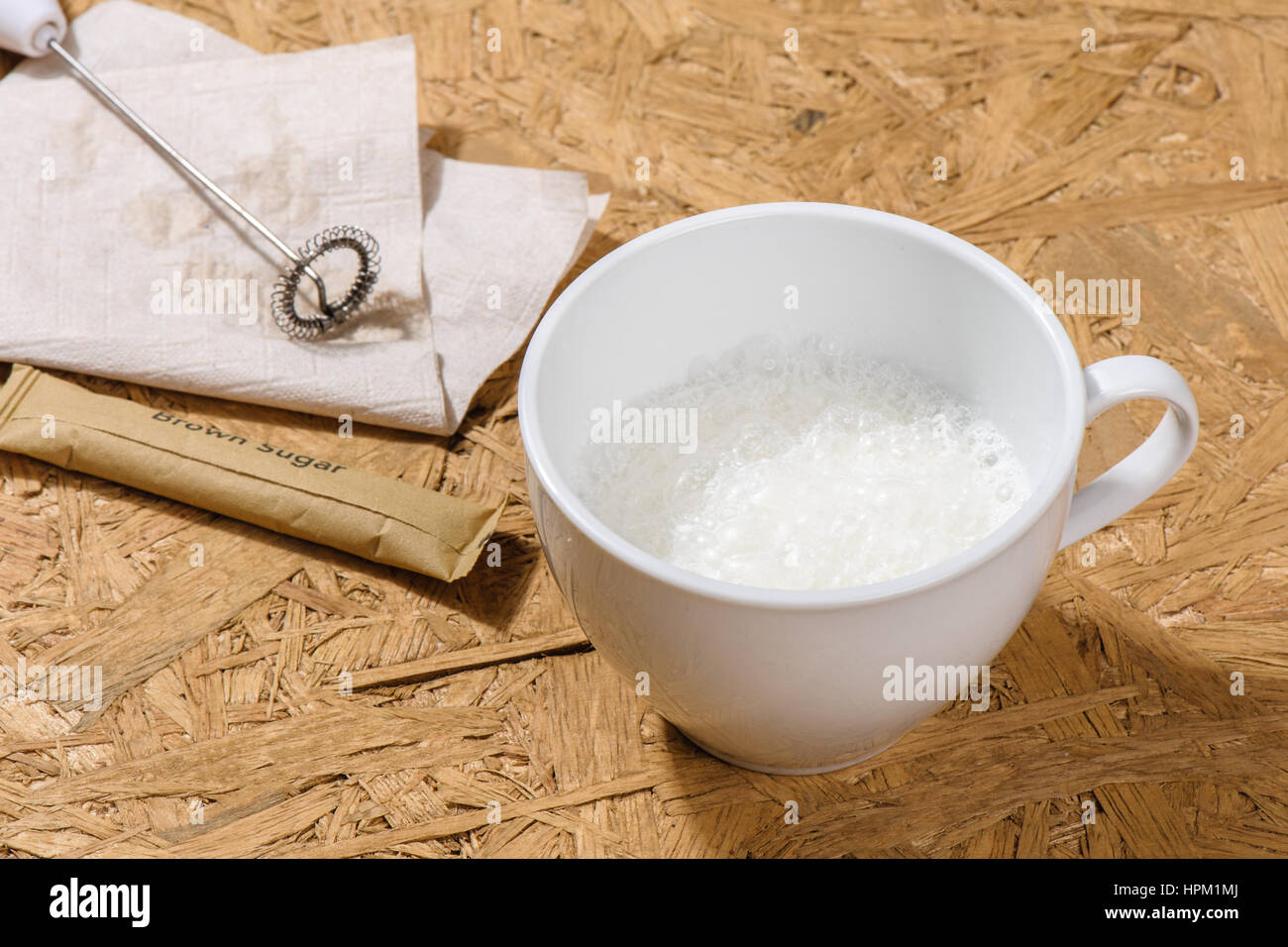 milk with bubbles, foamy milk, making bubbles milk Stock Photo - Alamy