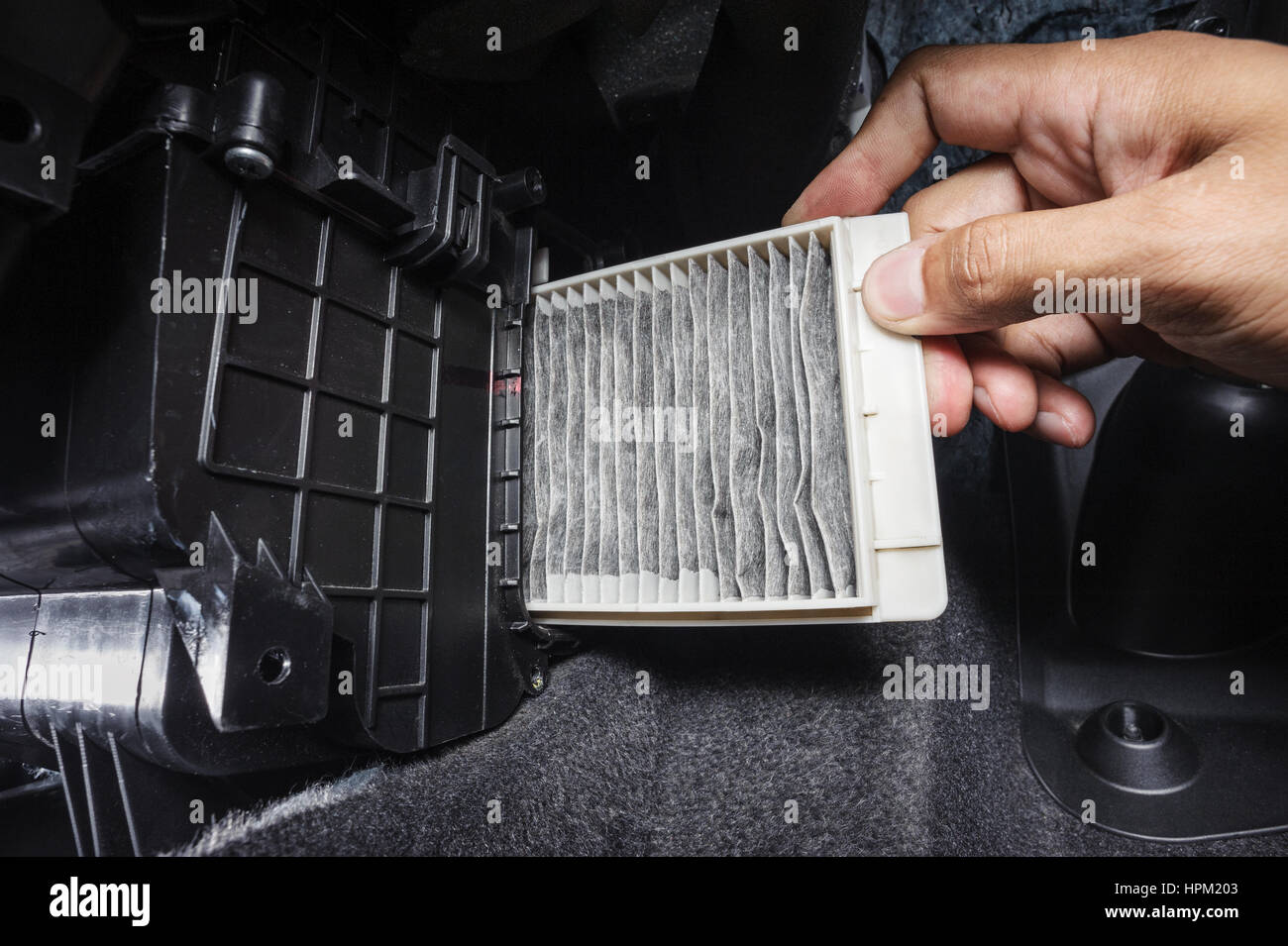 replacing cabin air conditioner filter of car Stock Photo - Alamy
