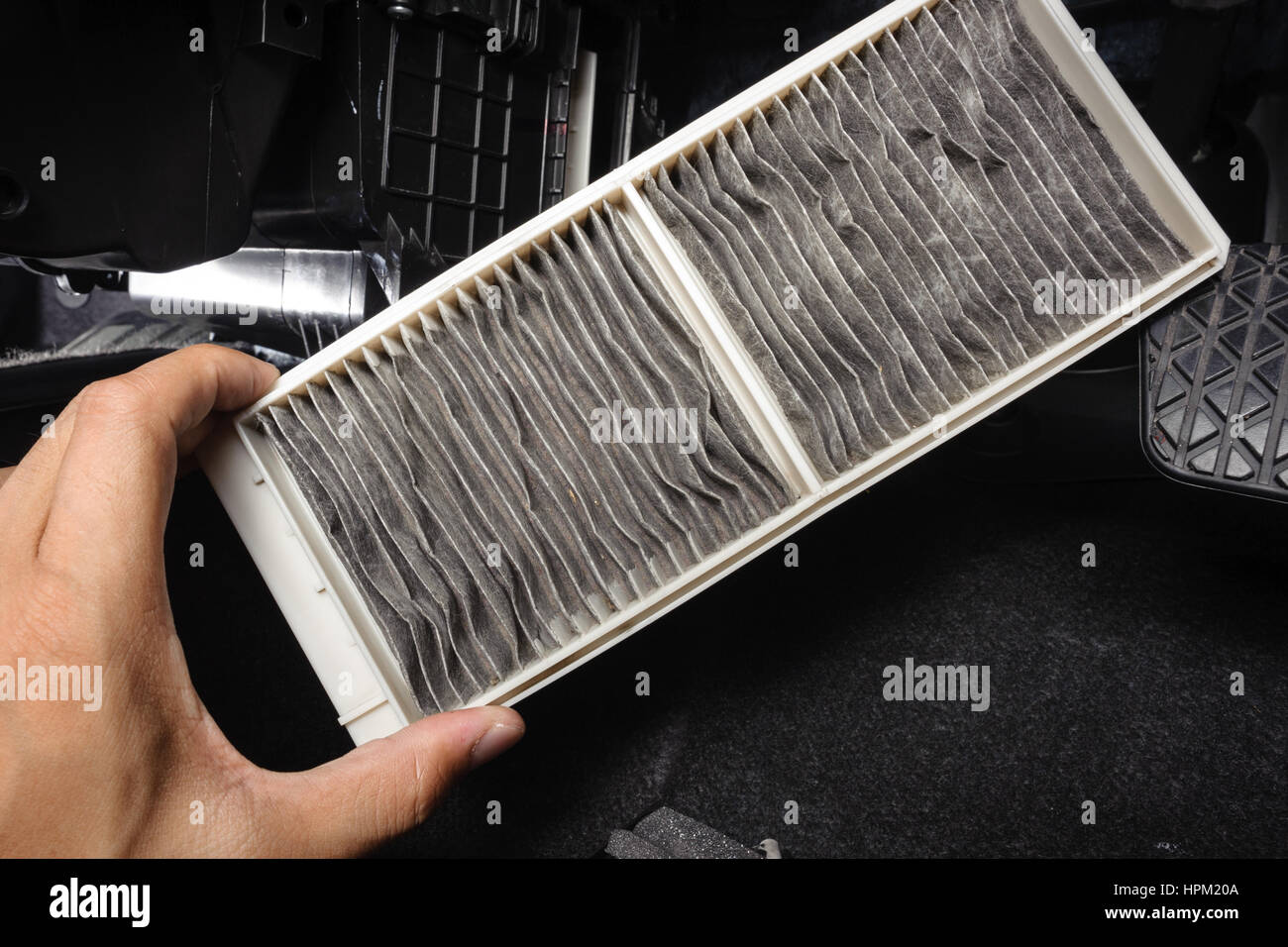 replacing cabin air conditioner filter of car Stock Photo - Alamy