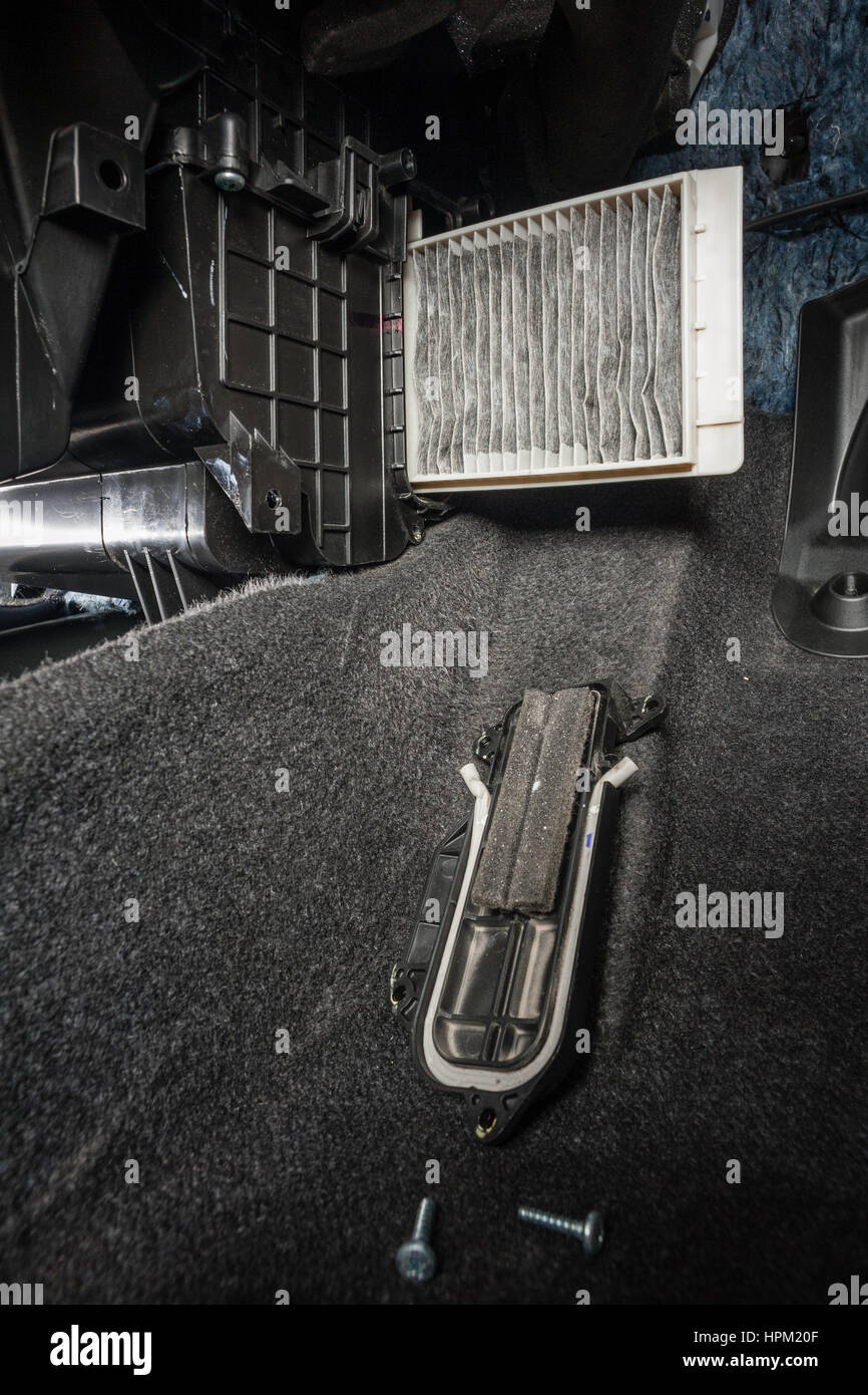 replacing cabin air conditioner filter of car Stock Photo - Alamy