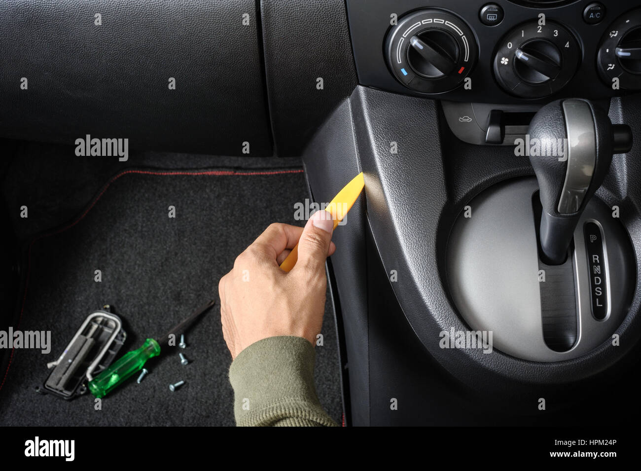 disassembly the center console of the car, transportation concept Stock ...
