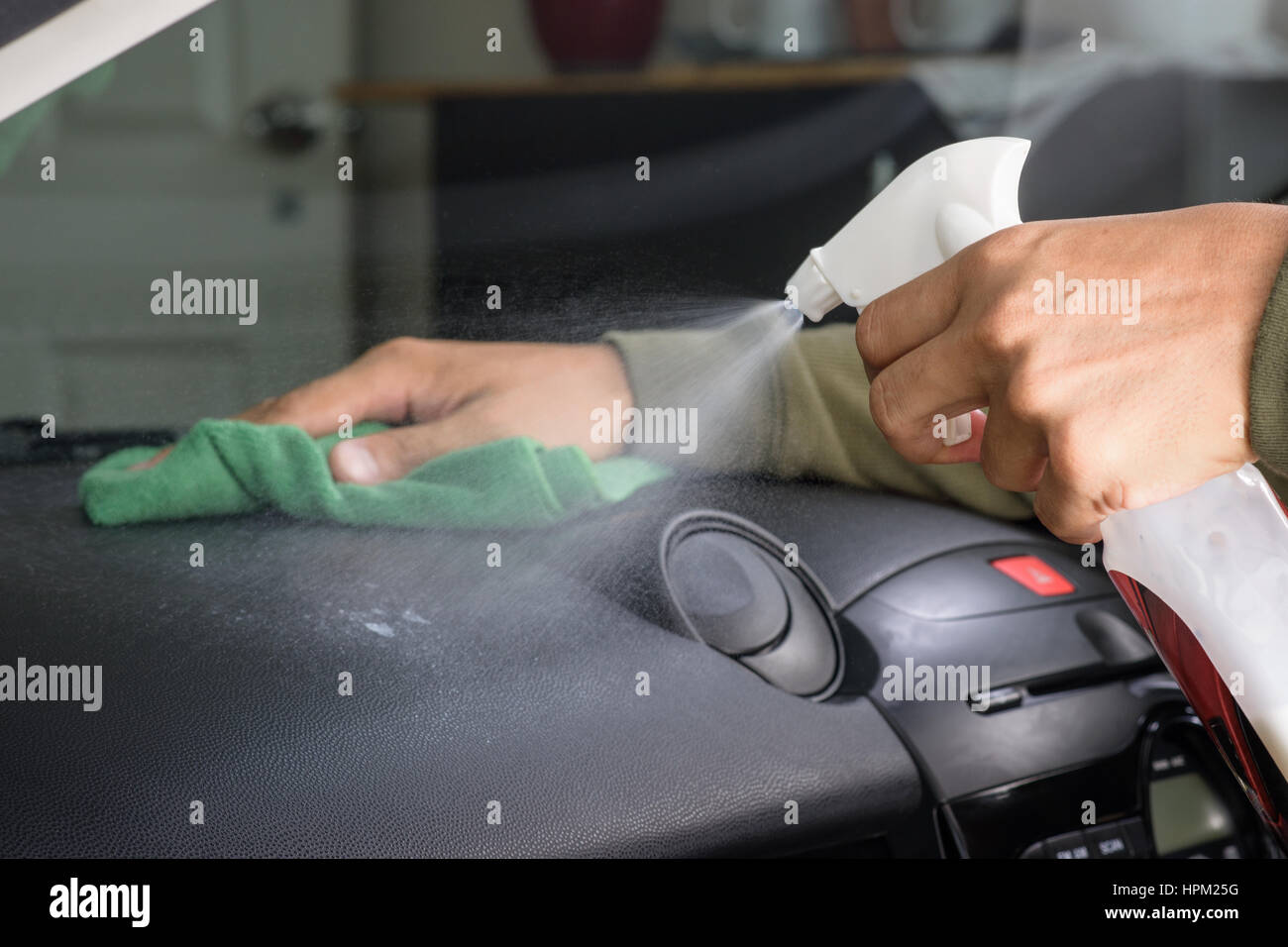 cleaning the car console with microfiber cloth Stock Photo - Alamy