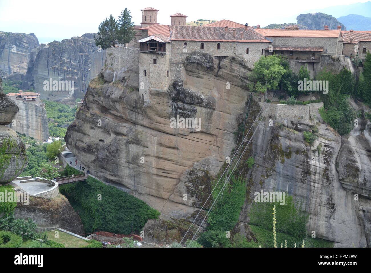 Meteora is formation of immense monolithic pillars and hills-like huge ...
