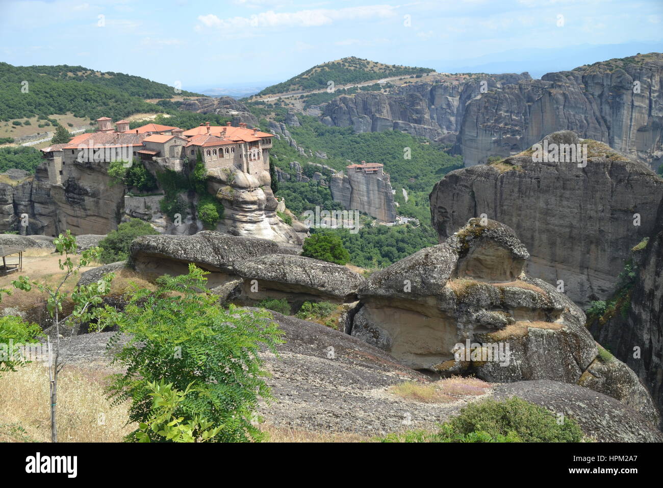 Meteora is formation of immense monolithic pillars and hills-like huge ...