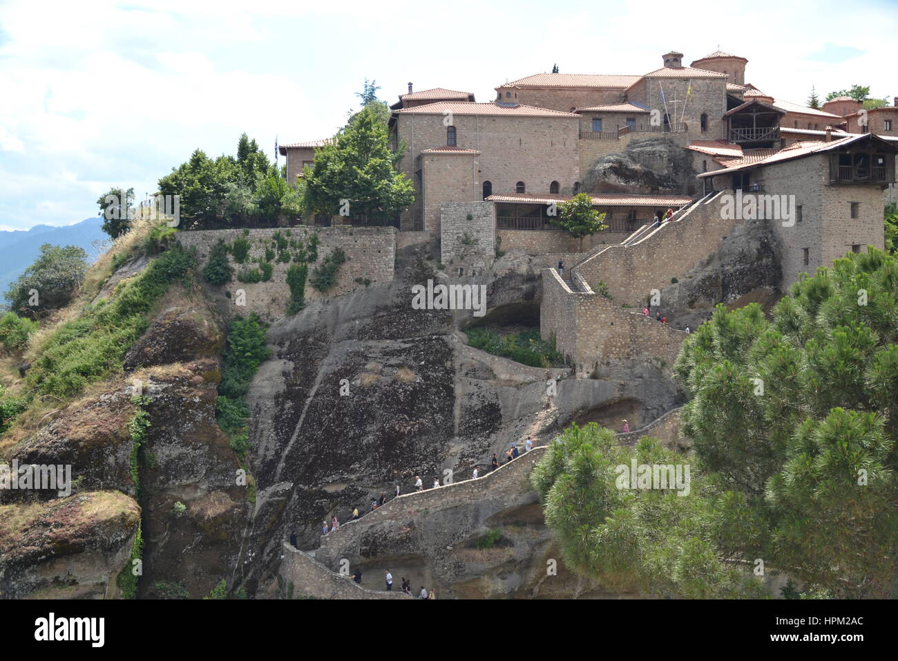 Meteora is formation of immense monolithic pillars and hills-like huge ...