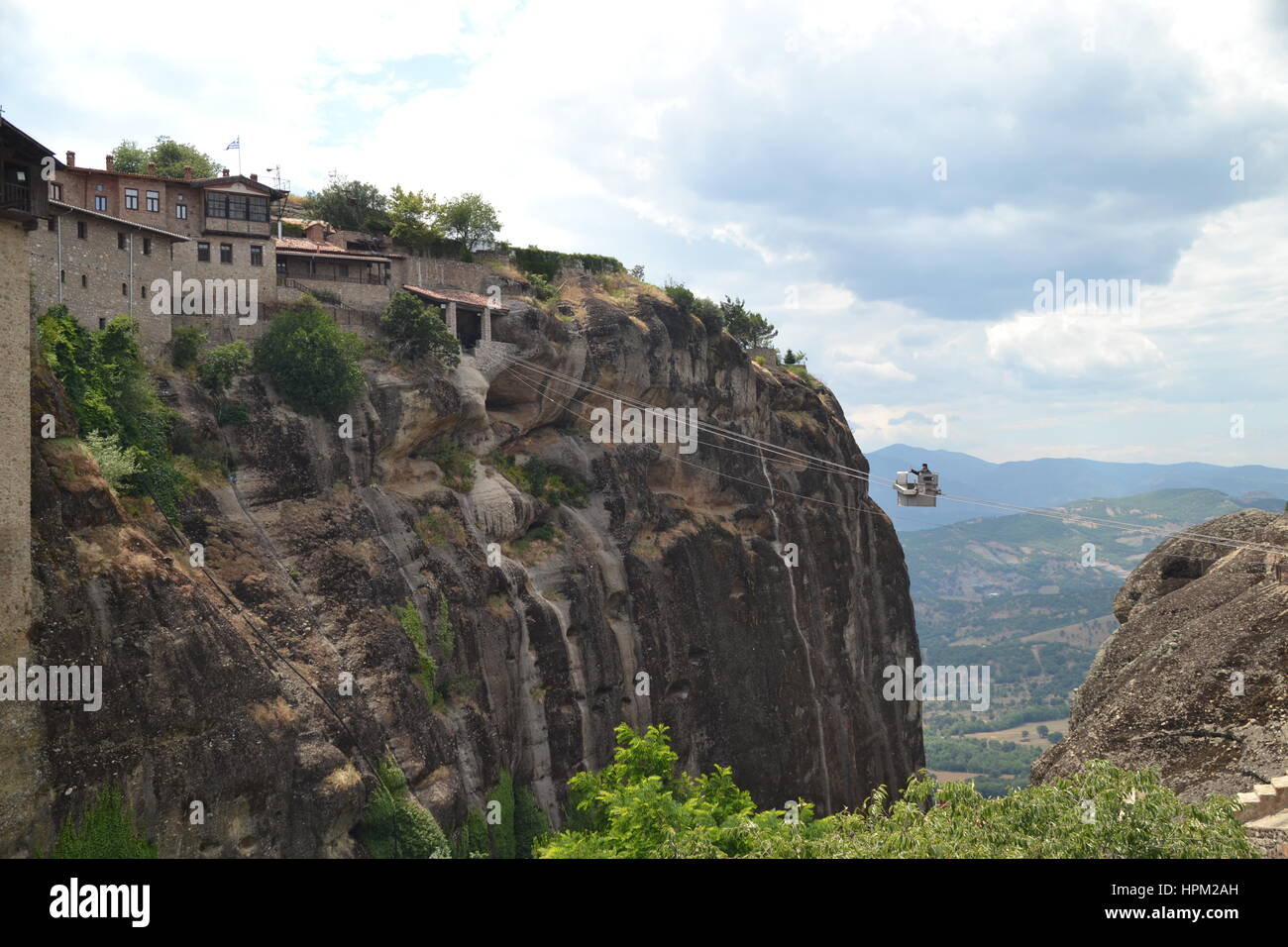 Meteora is formation of immense monolithic pillars and hills-like huge ...
