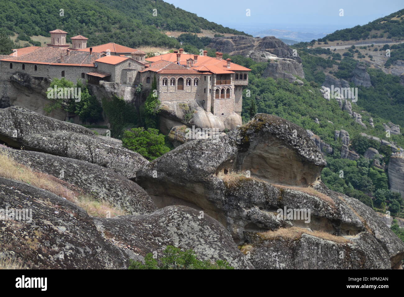 Meteora is formation of immense monolithic pillars and hills-like huge ...