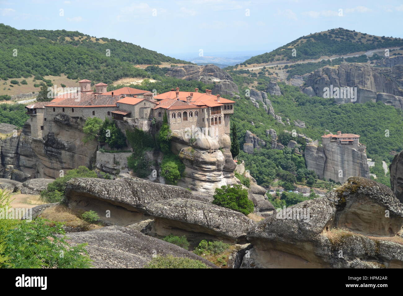Meteora is formation of immense monolithic pillars and hills-like huge ...