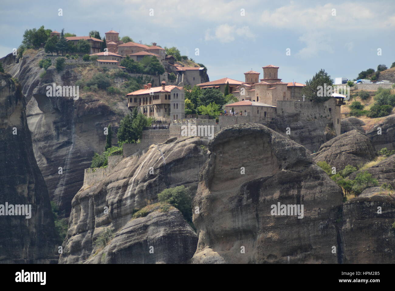 Meteora is formation of immense monolithic pillars and hills-like huge ...