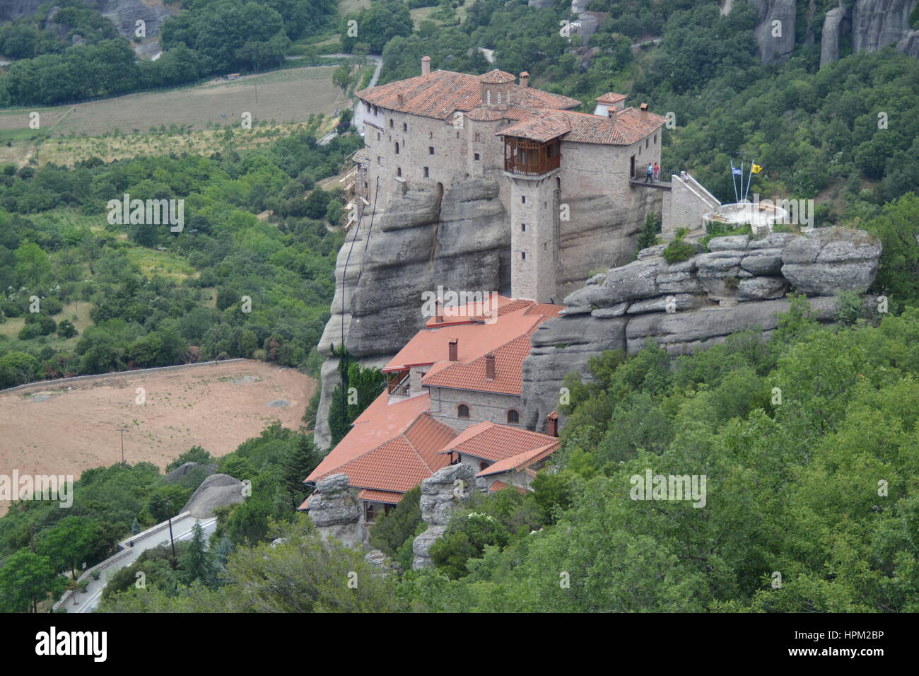 Meteora is formation of immense monolithic pillars and hills-like huge ...