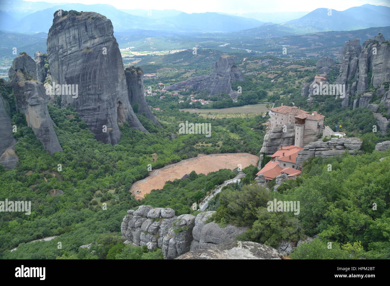 Meteora is formation of immense monolithic pillars and hills-like huge ...