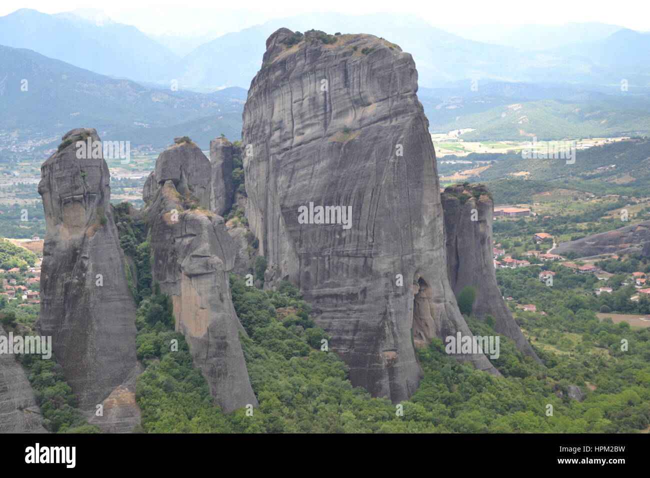 Meteora is formation of immense monolithic pillars and hills-like huge ...