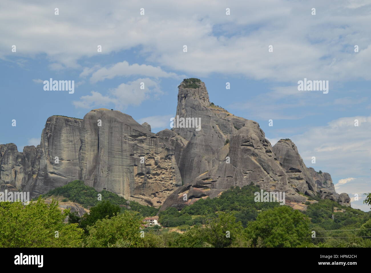 Meteora is formation of immense monolithic pillars and hills-like huge ...