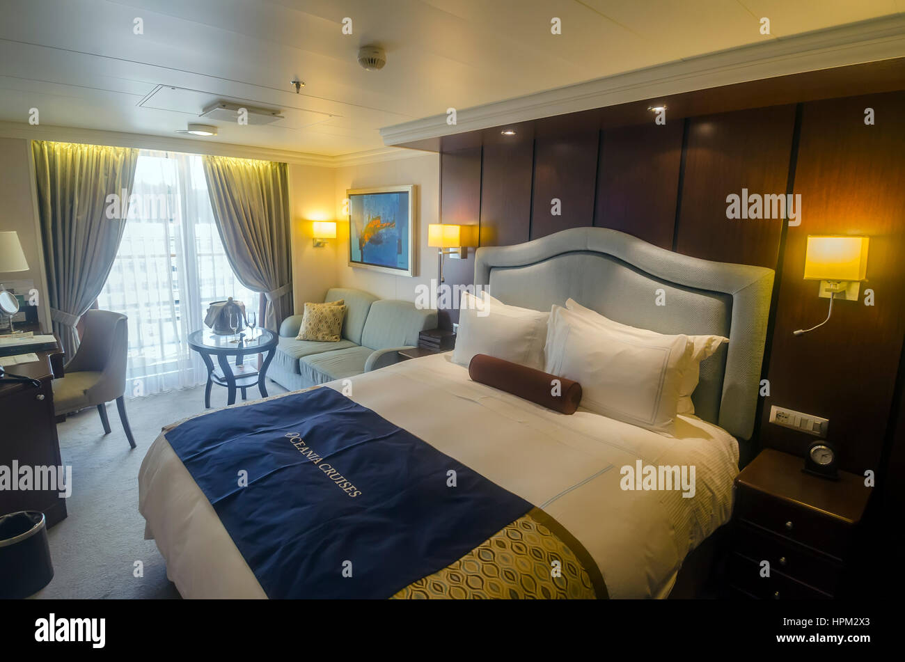 Oceania Marina Concierge Stateroom verandah bedroom Stock Photo - Alamy