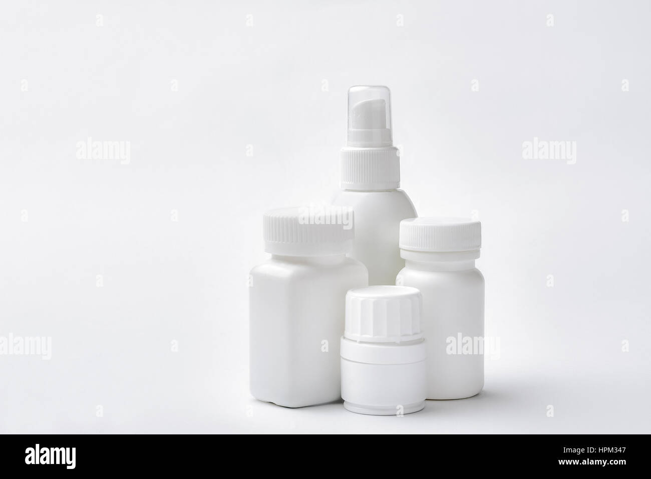 White vials with medicine Stock Photo - Alamy