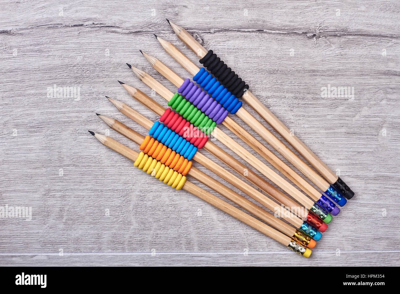 Graphite pencils on wooden background Stock Photo - Alamy