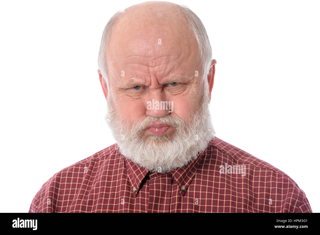 Handsome Bald And Bearded Senior Man Shows Resentful Facial Expression