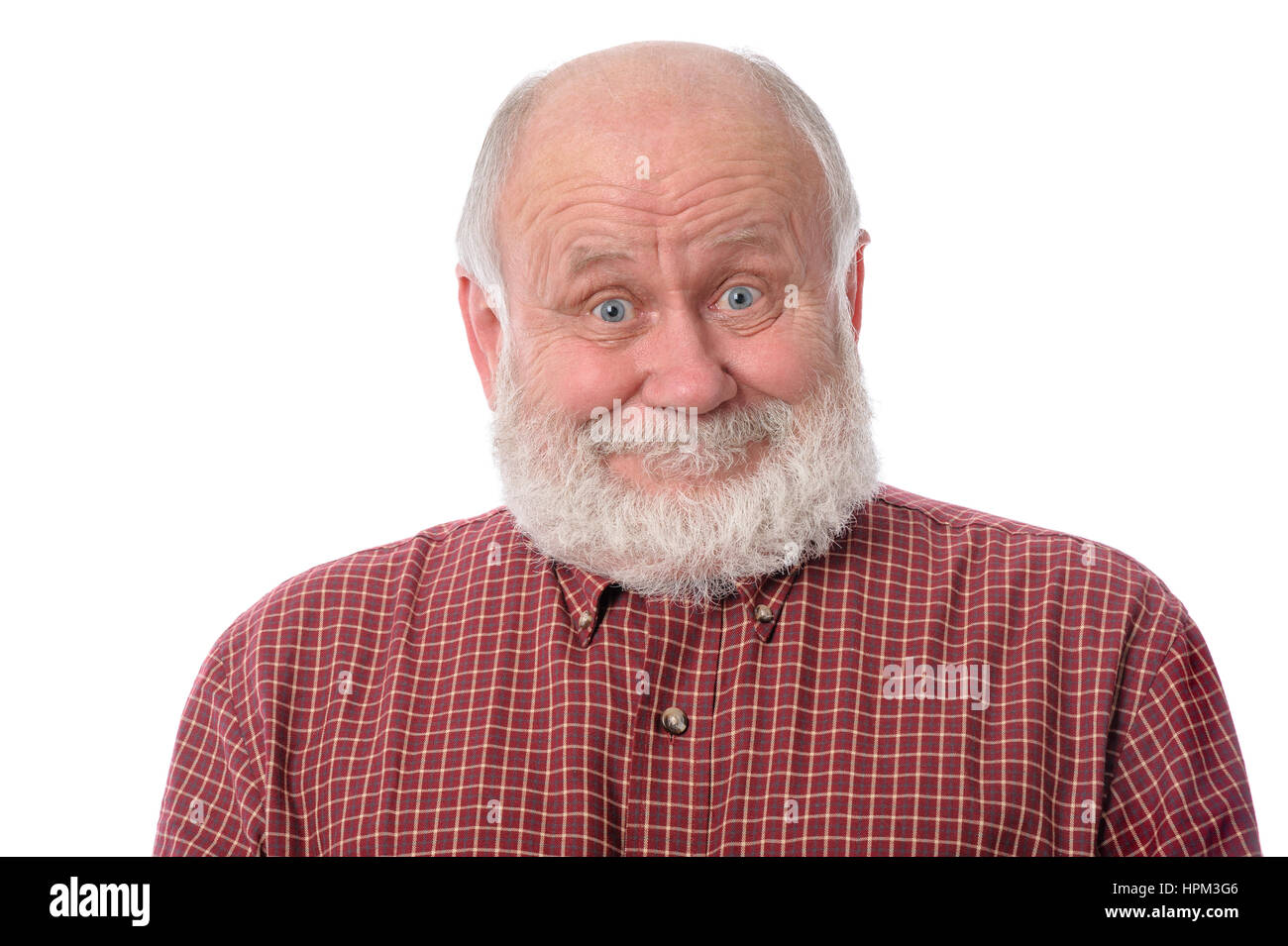 Handsome bald and bearded senior man shows surprised smile grimace or facial expression ...