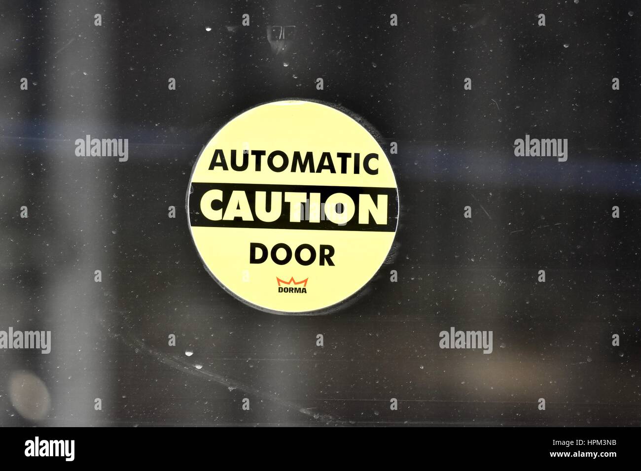 Automatic glass door sign Stock Photo - Alamy