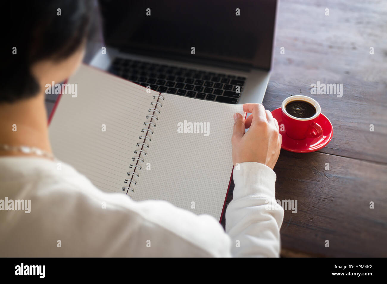 Woman looking at note paper, stock photo Stock Photo - Alamy