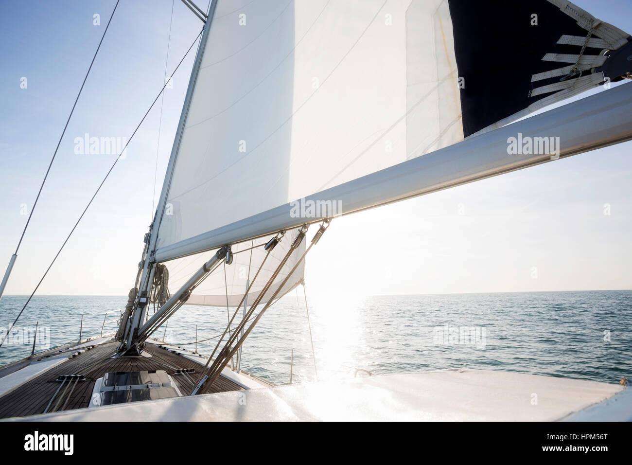 Luxury yacht sailing in sea on sunny day Stock Photo - Alamy