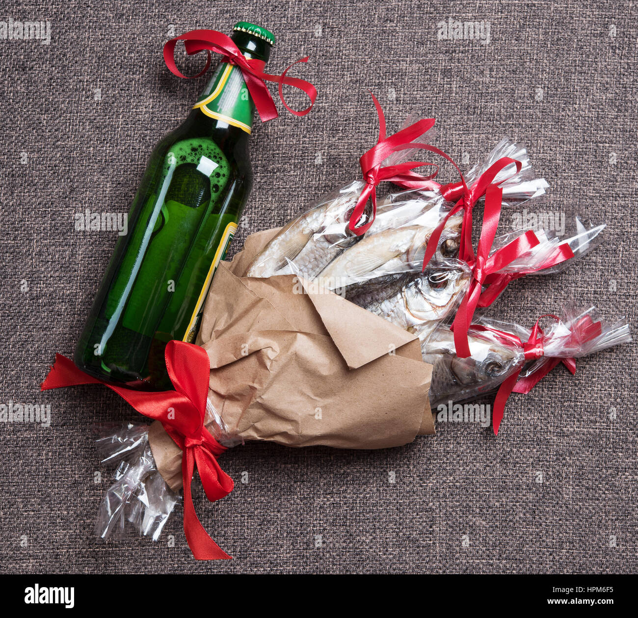 beer with a bunch of salty fish Stock Photo - Alamy