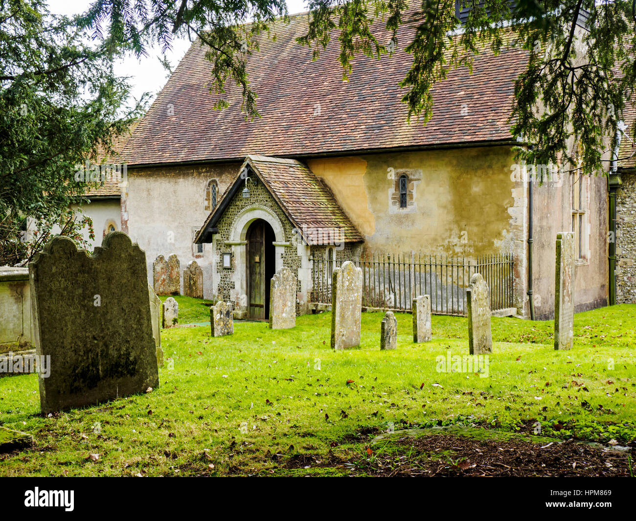 The entrance porch of the parish church of All Saints’, Compton, is ...