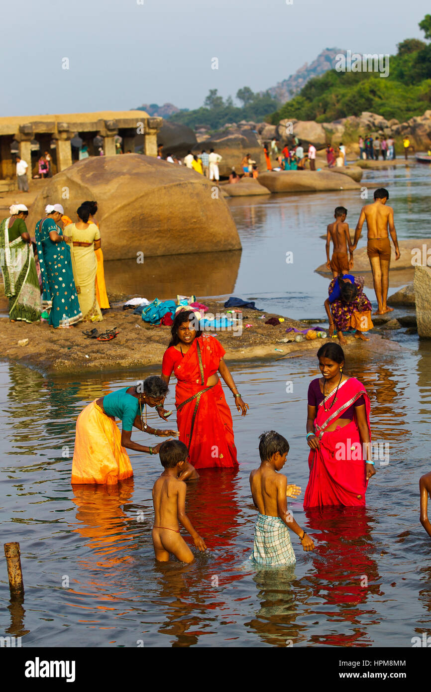 Indian woman bathing in river hi-res stock photography and images - Alamy