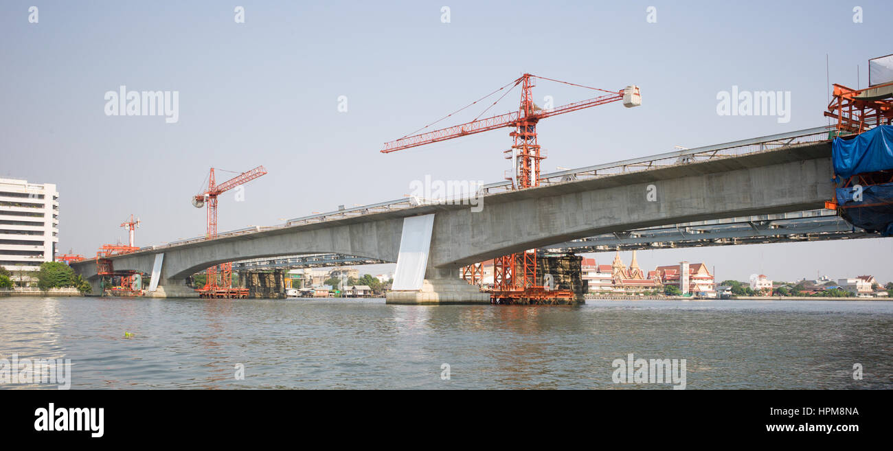 Reinforced concrete multi span bridge under construction across river ...