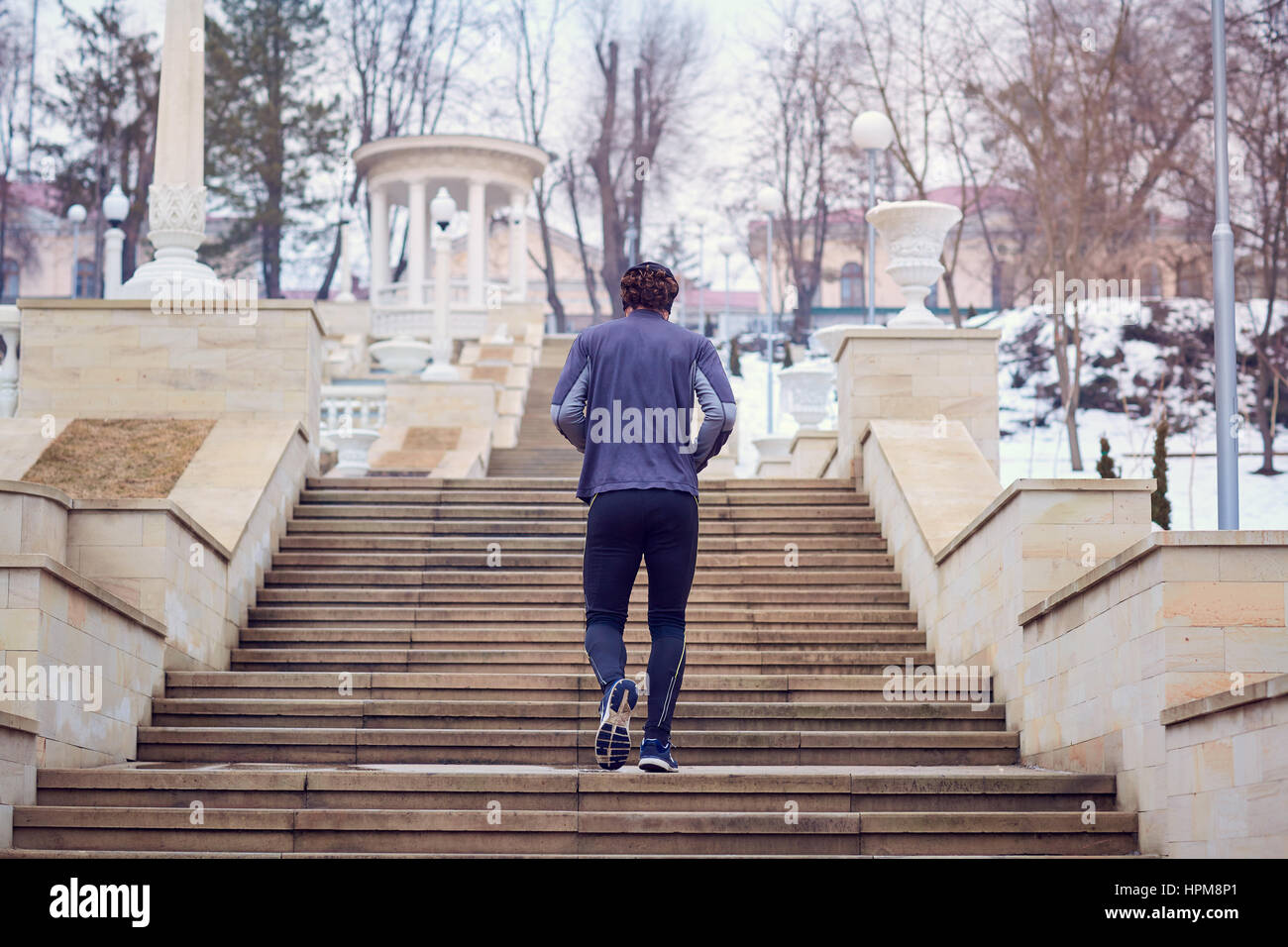 Man running up stairs hi-res stock photography and images - Alamy