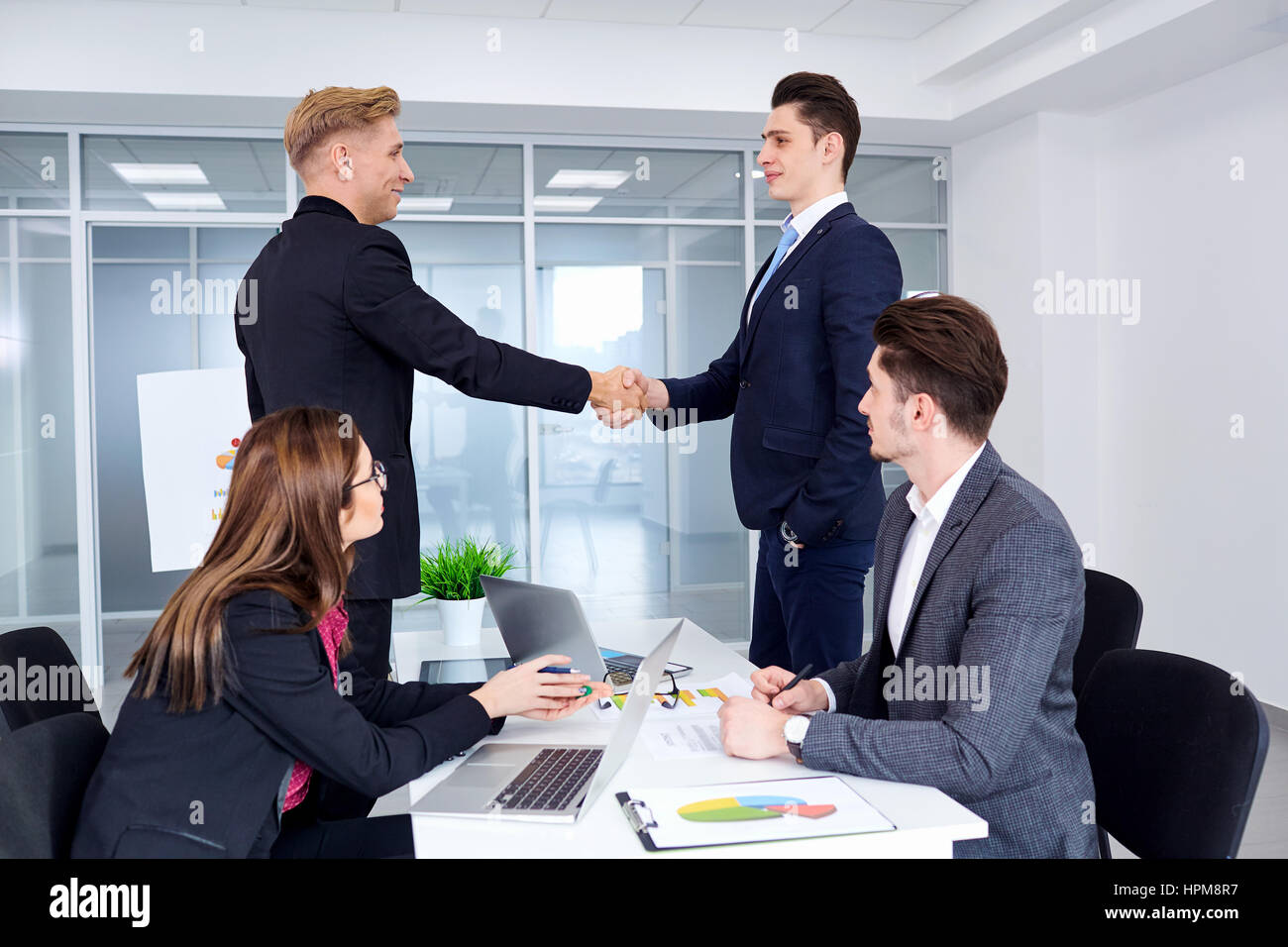 Handshake of business people in the office. Conclusion businessm Stock ...