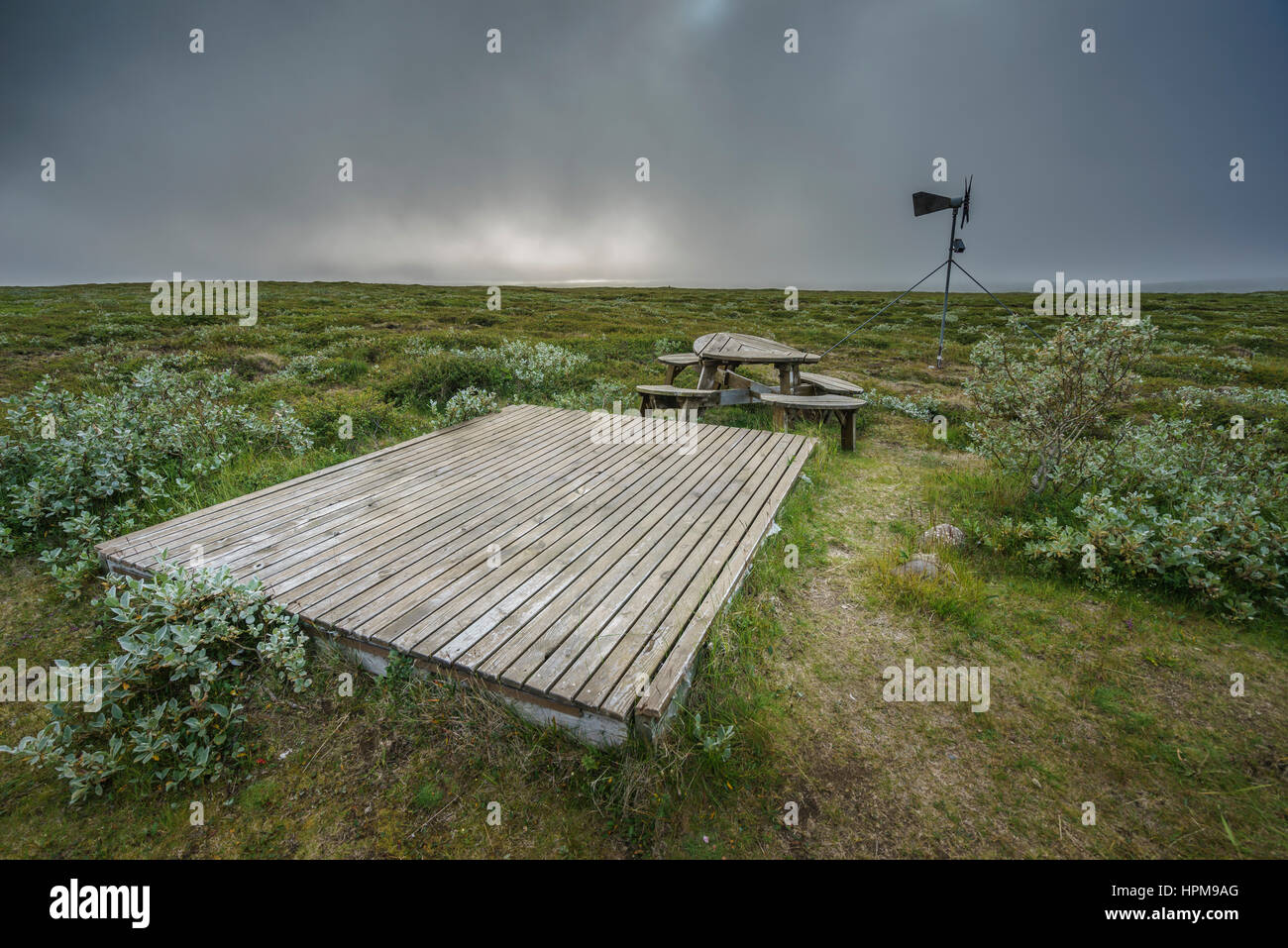Wood platform and picnic table, background-anemometer-wind measuring ...