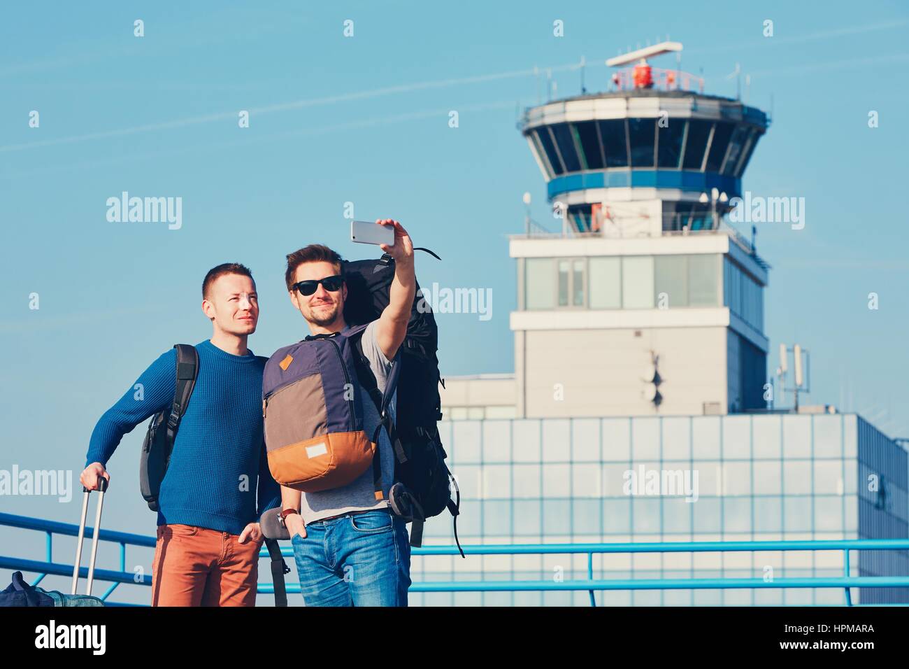 Two friends traveling together. Travelers taking a selfie at the ...