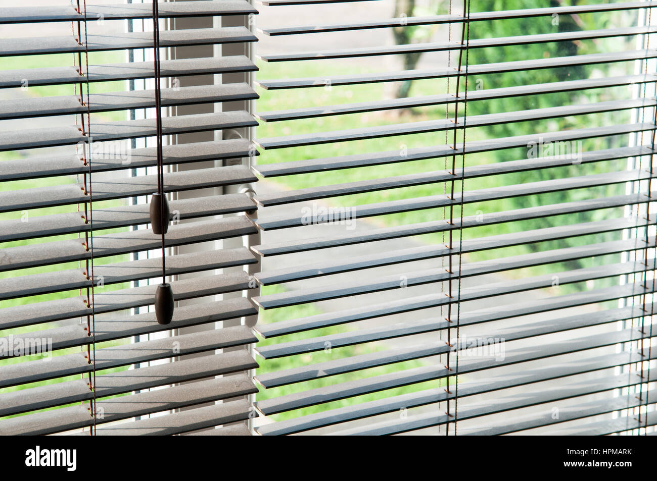 Looking out through an open blind and window Stock Photo - Alamy