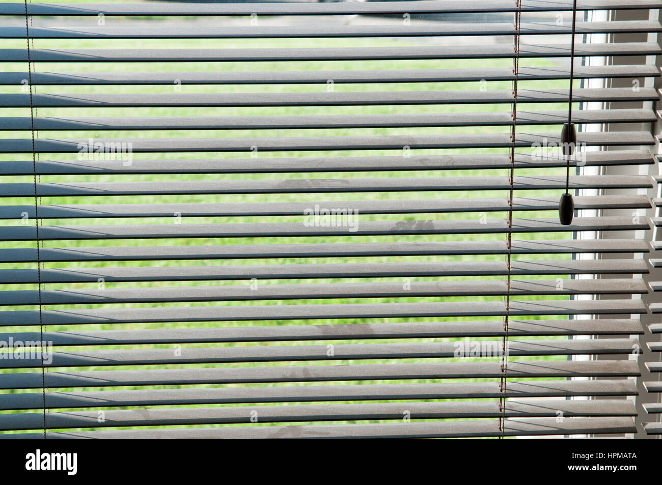 Looking out through an open blind and window Stock Photo - Alamy