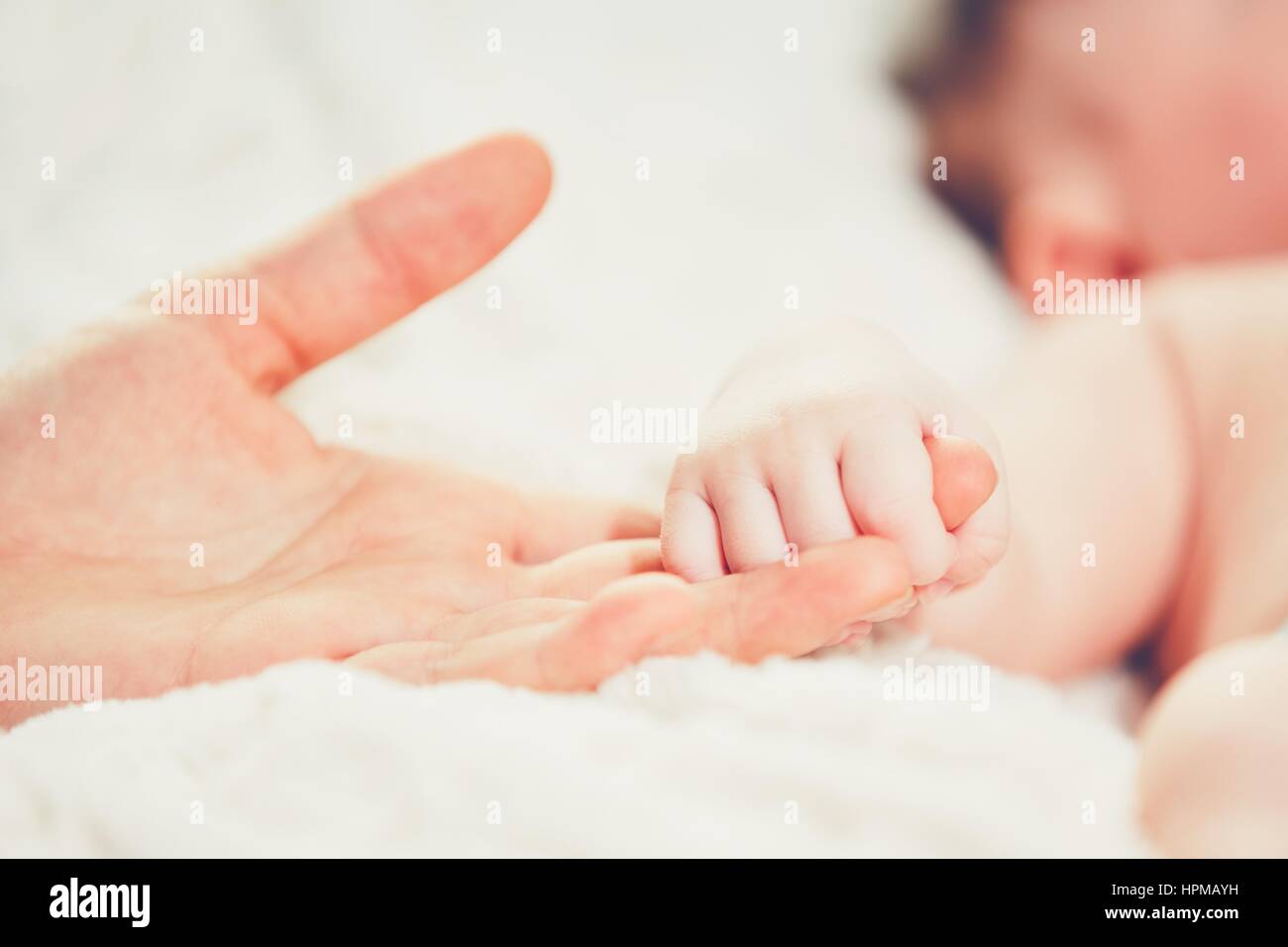 Baby touch mother bed hi-res stock photography and images - Alamy