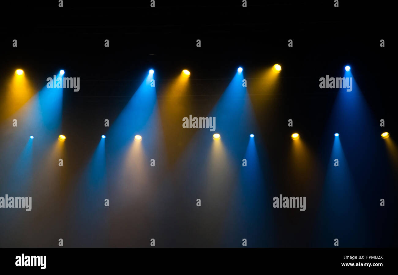 Stage lights on concert. Lighting equipment with multi-colored beams ...